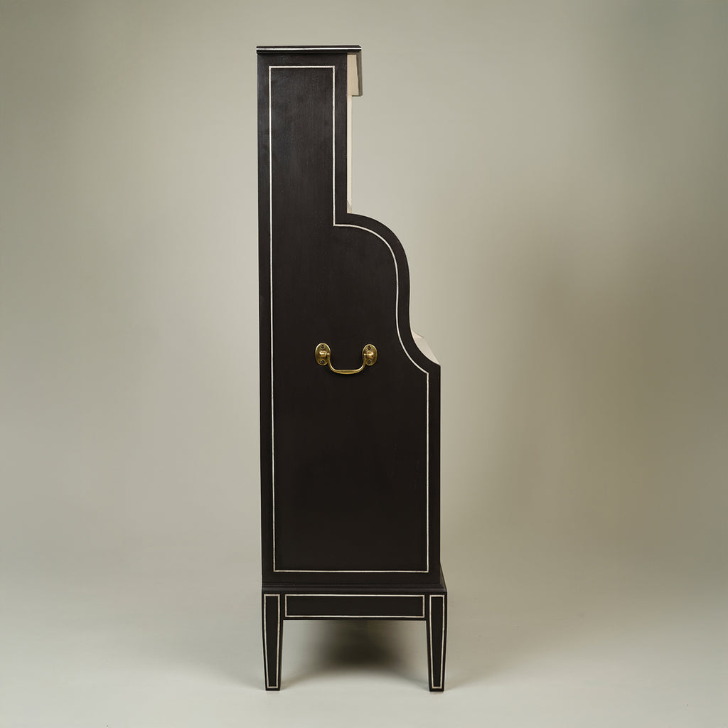A WATERFALL BOOKCASE – Sibyl Colefax & John Fowler
